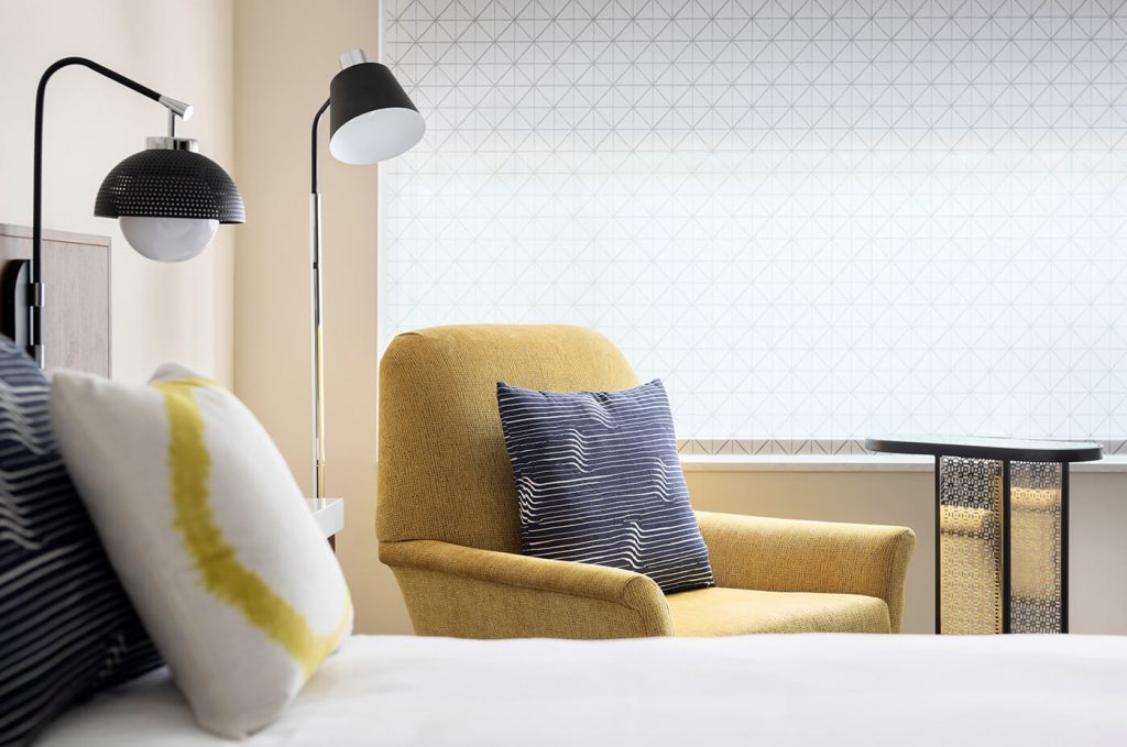 Deluxe King Bed Seating Area | Celeste Hotel